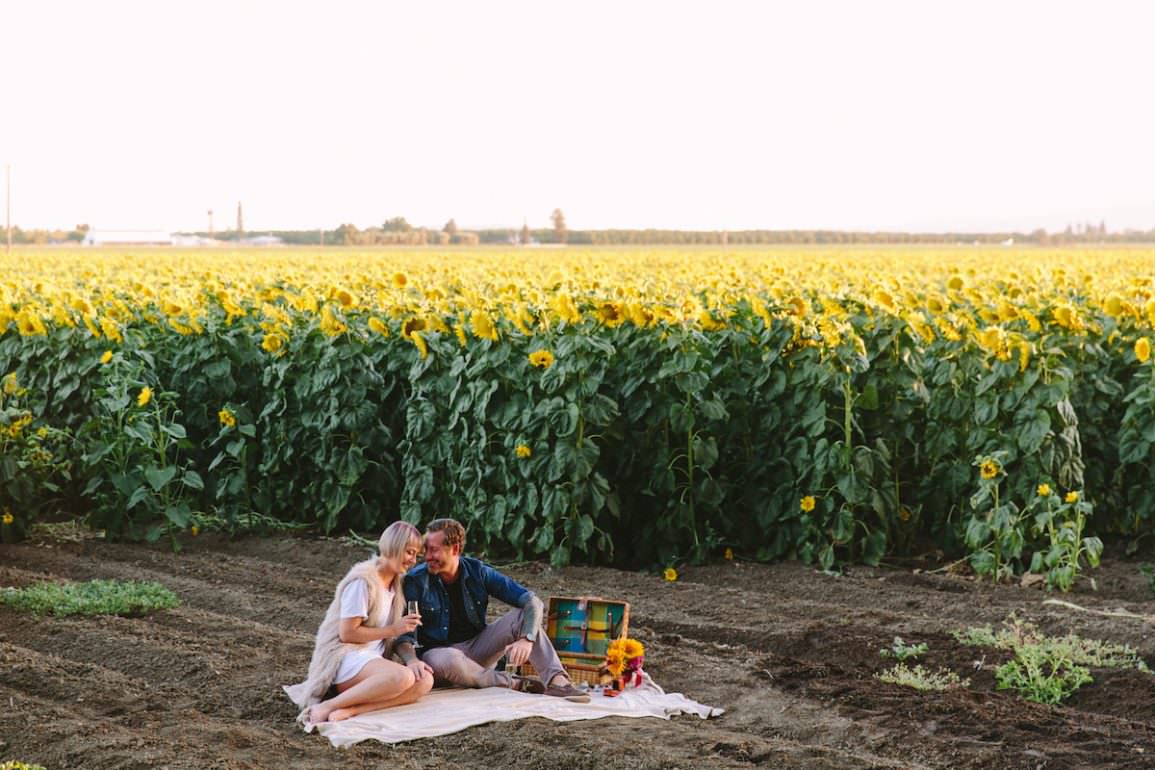 Lisa and Shane's Emotional Sunflower Proposal at Sunset - Love Inc. Mag