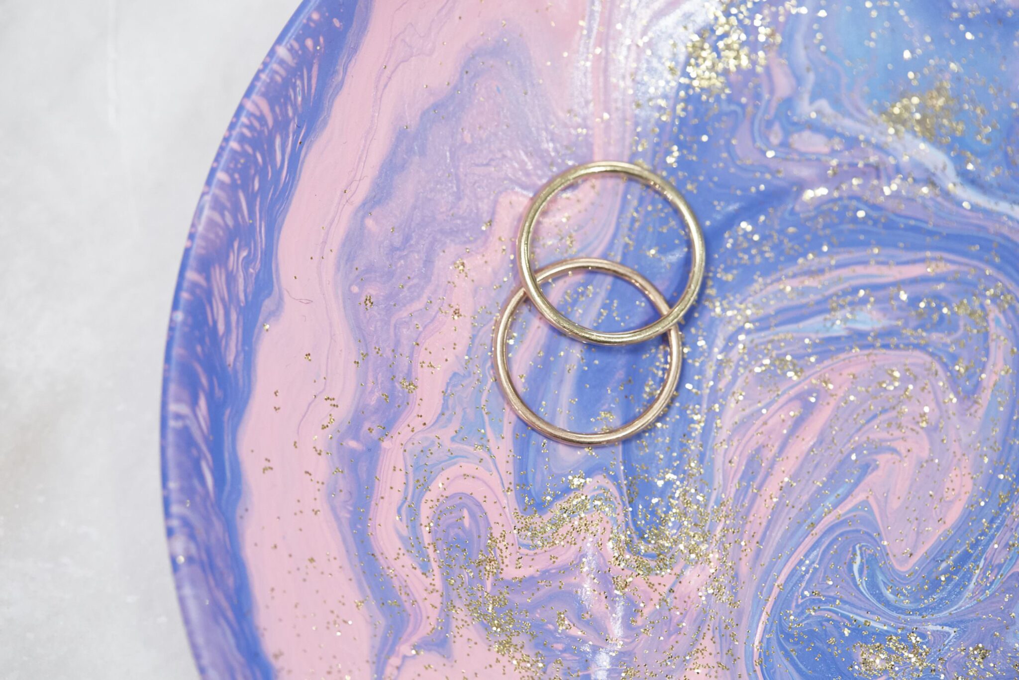 DIY Galactic Wedding Ring Dish Using Paint Pouring - Love Inc. Mag